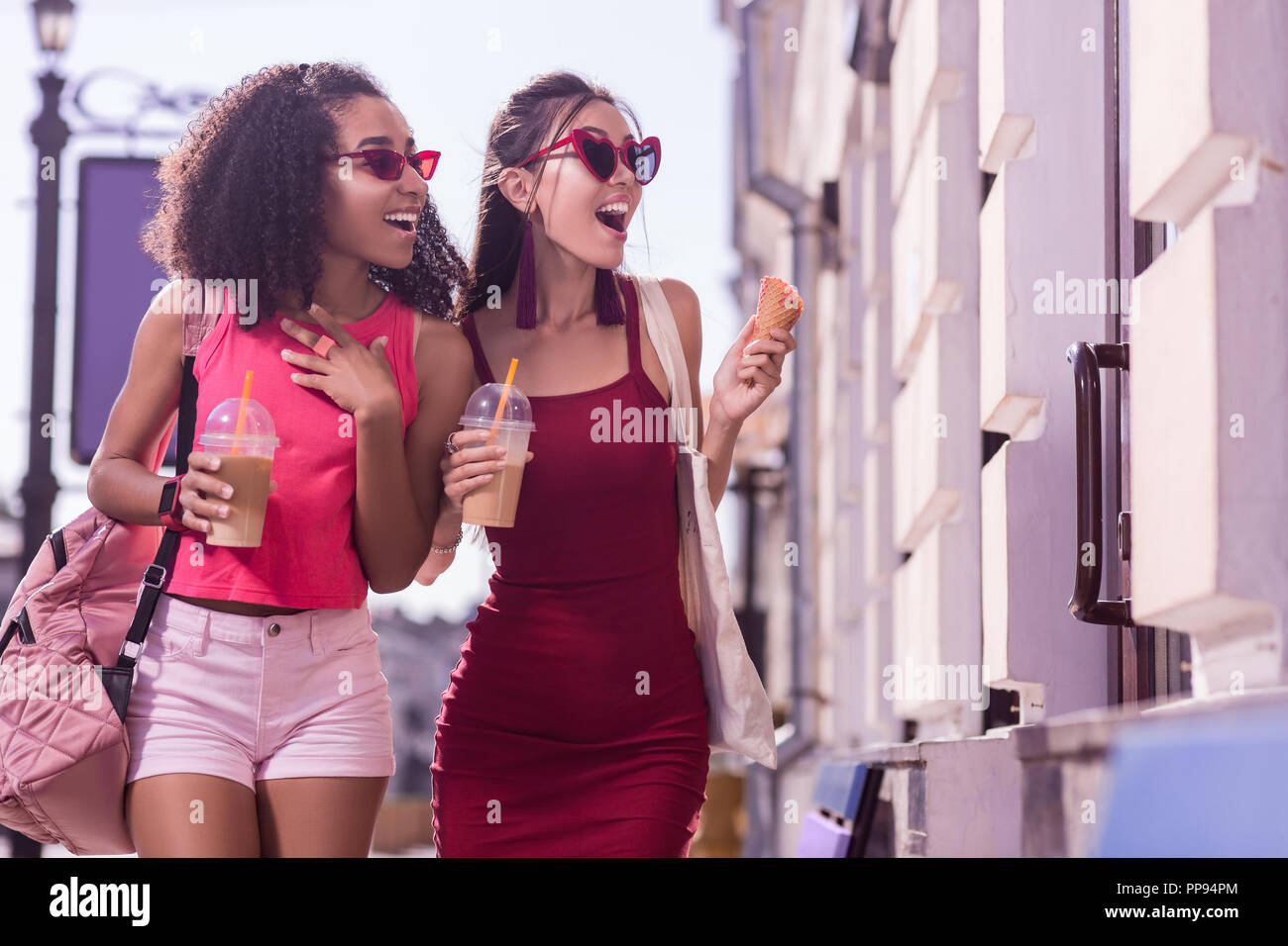 Joyful happy nice women feeling very excited Stock Photo - Alamy