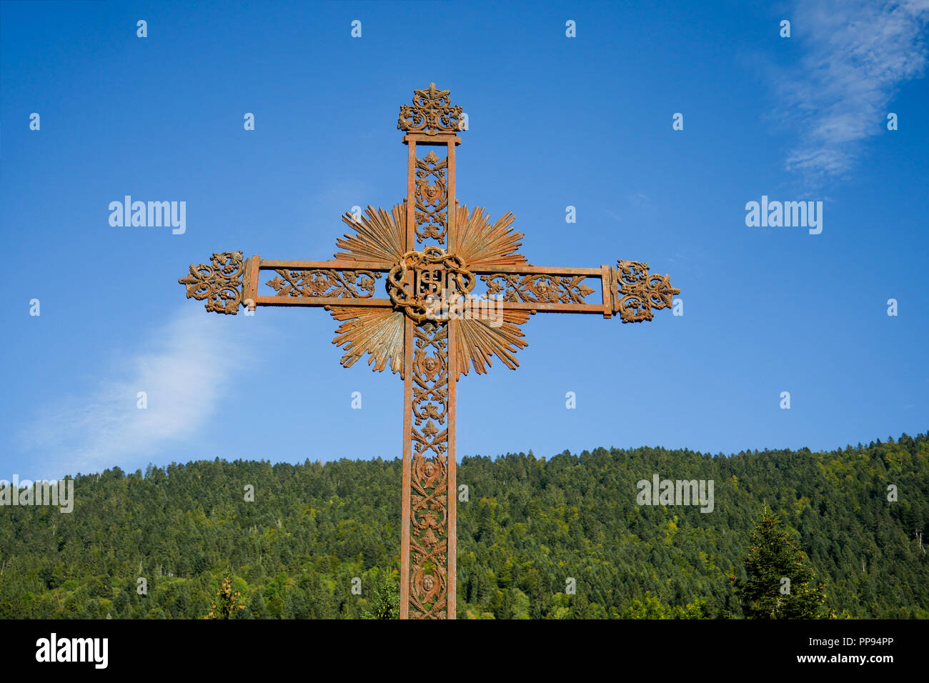 Catholic cross facing Saint-Hugues de Chartreuse church gate, Saint ...
