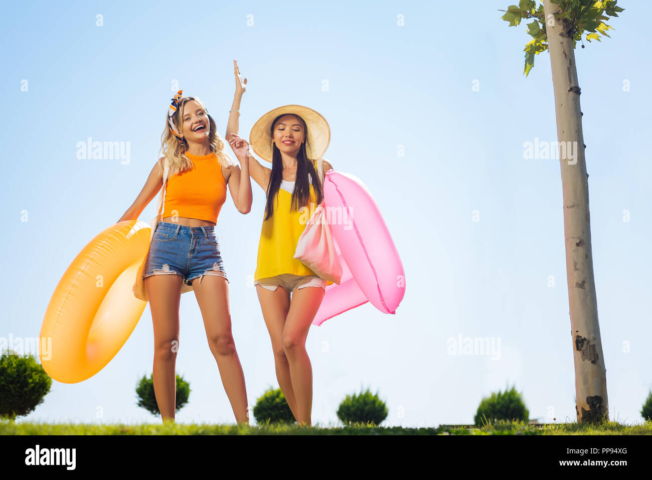 Joyful happy young women having fun together Stock Photo - Alamy