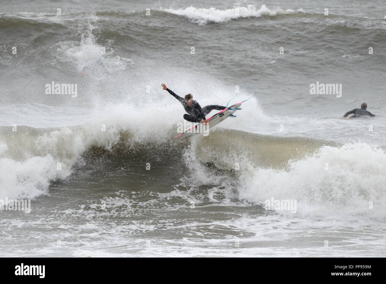 Surfing on the Gower Stock Photo - Alamy