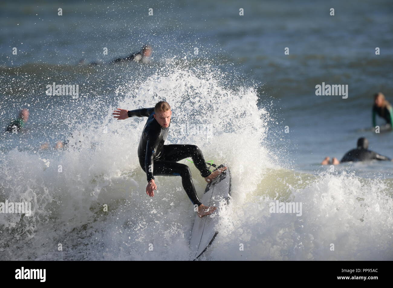 Surfing on the Gower Stock Photo - Alamy