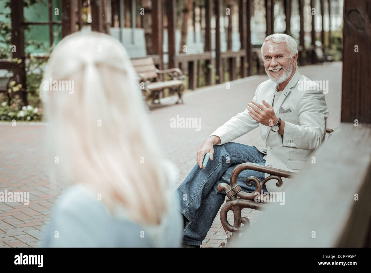 Delighted mature man talking hi-res stock photography and images - Alamy