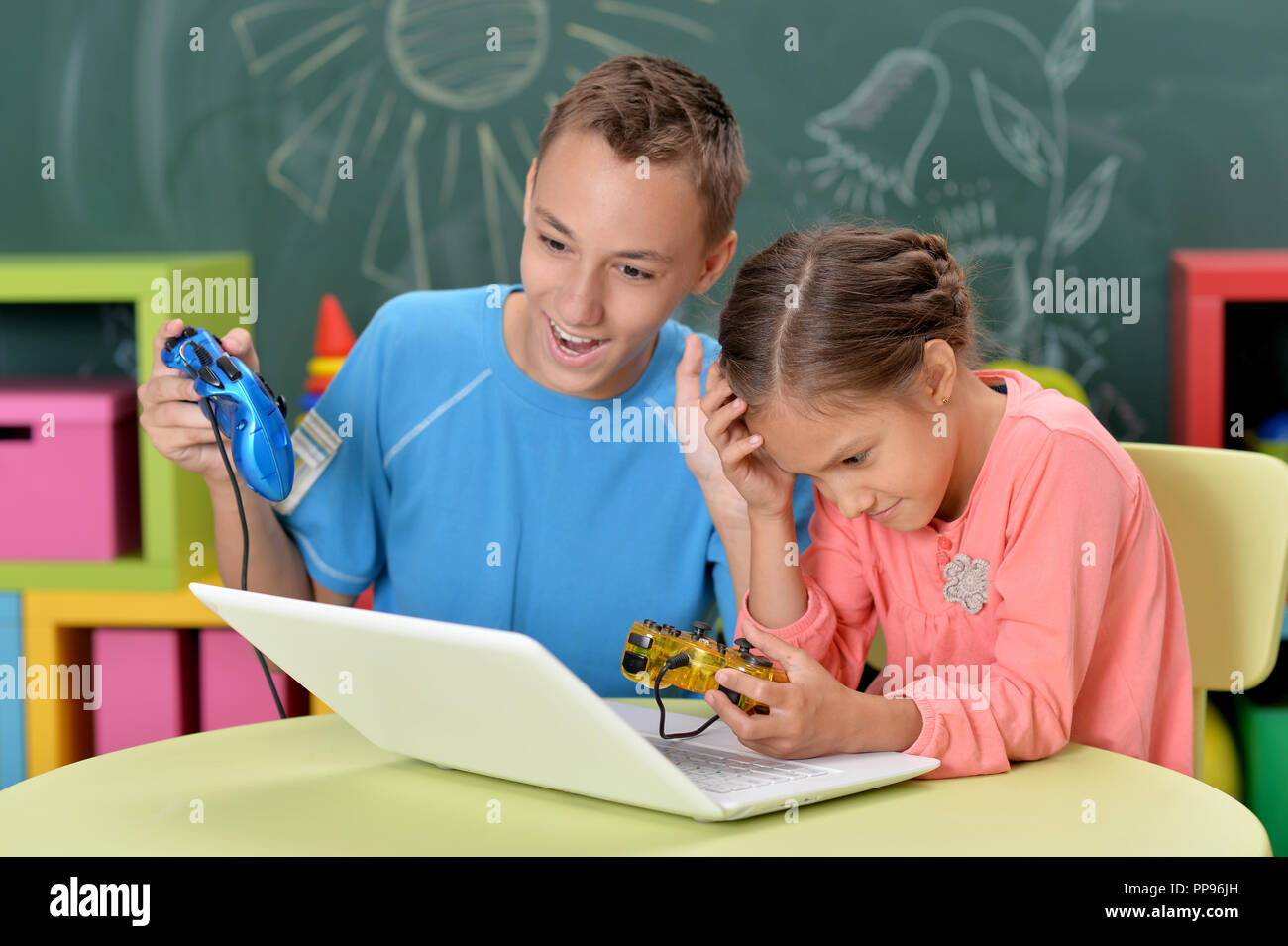 Youngster computer table hi-res stock photography and images - Alamy