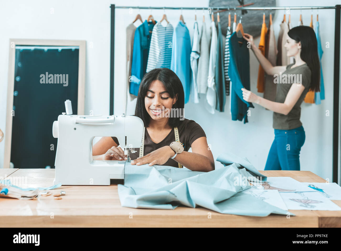 Dressmaker creating new dress hi-res stock photography and images - Alamy