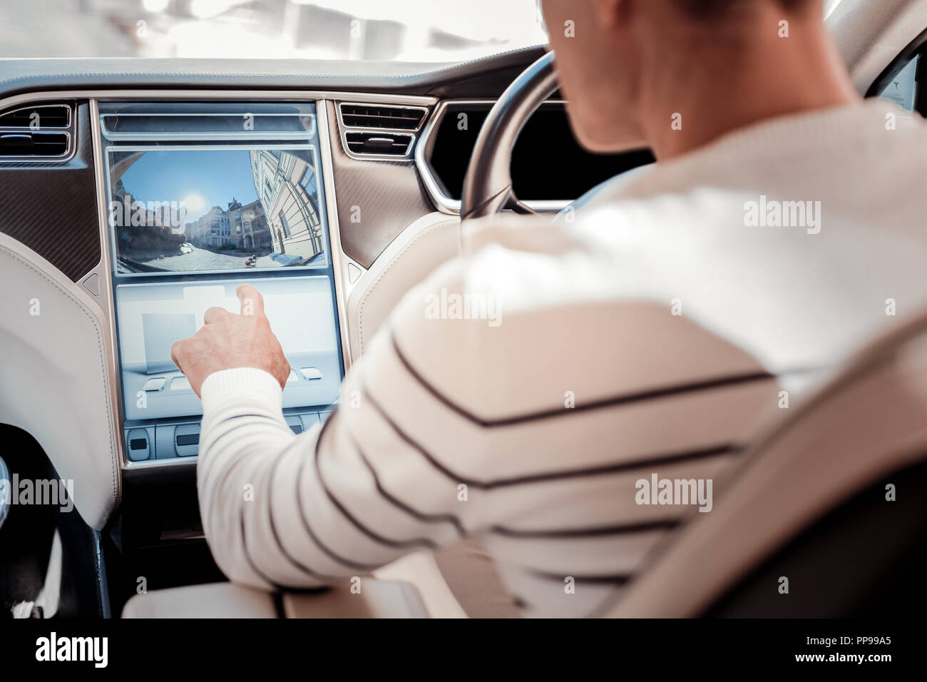 Back view of brunette that sitting in the auto Stock Photo - Alamy