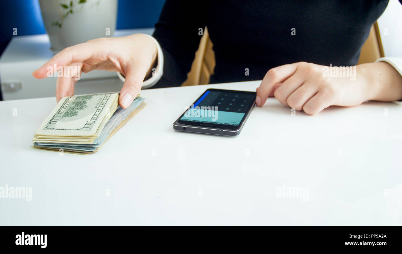Businesswoman counting dollar work money hi-res stock photography and ...