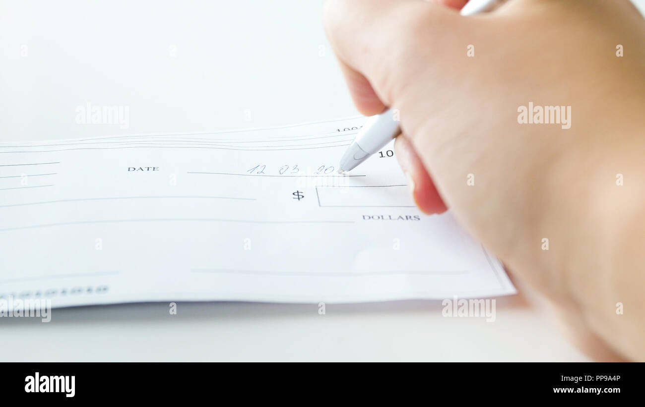 Cheque book pen signature hi-res stock photography and images - Alamy