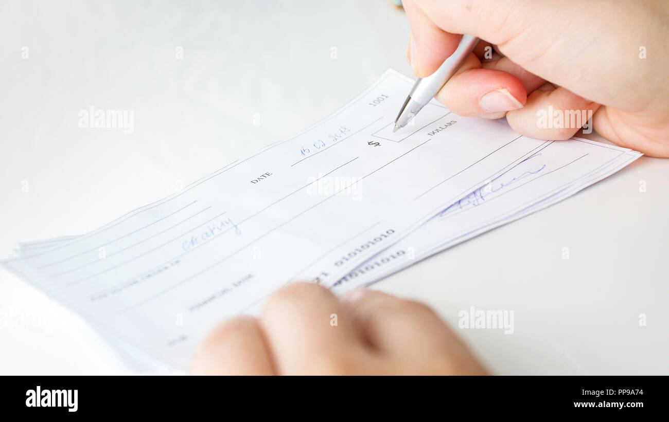 Salary cheque hi-res stock photography and images - Alamy