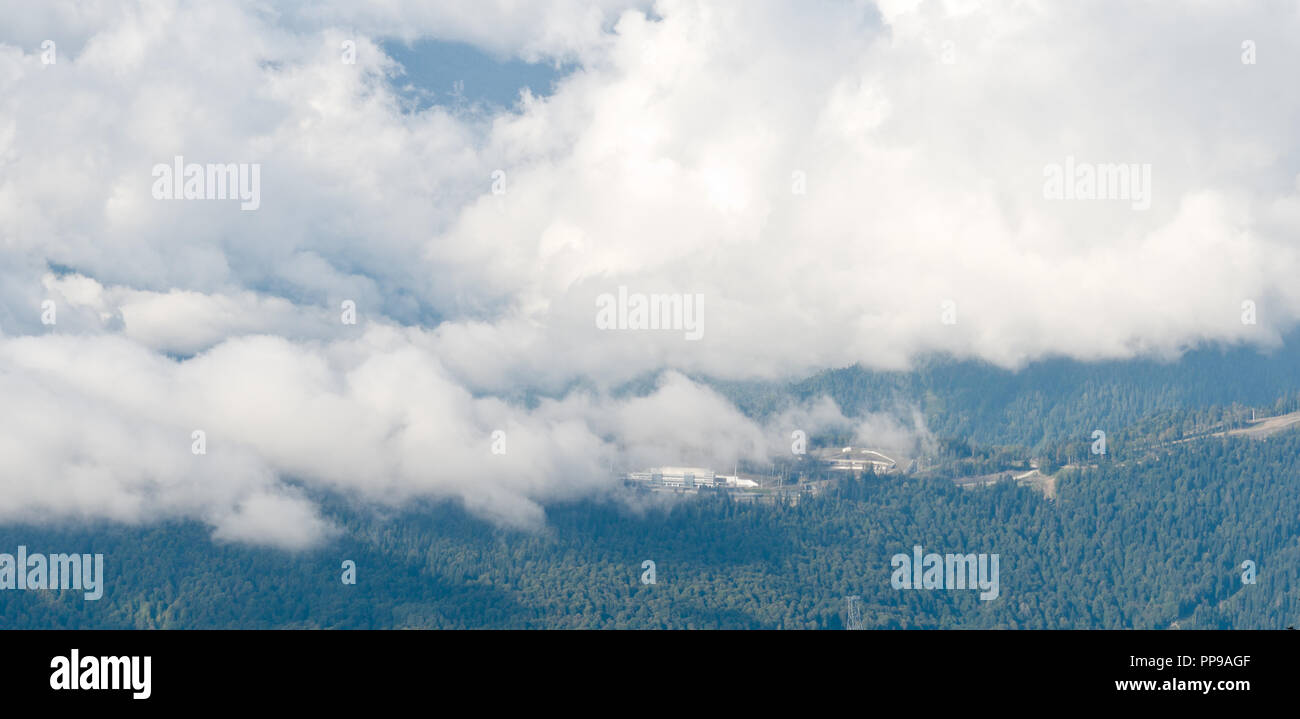 Beautiful clouds over mountains hi-res stock photography and images - Alamy
