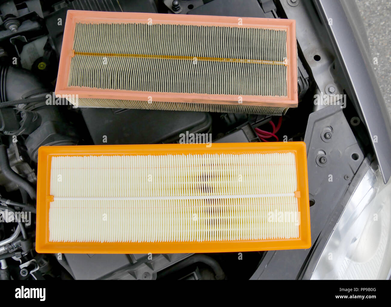the new and used car air filter Stock Photo - Alamy