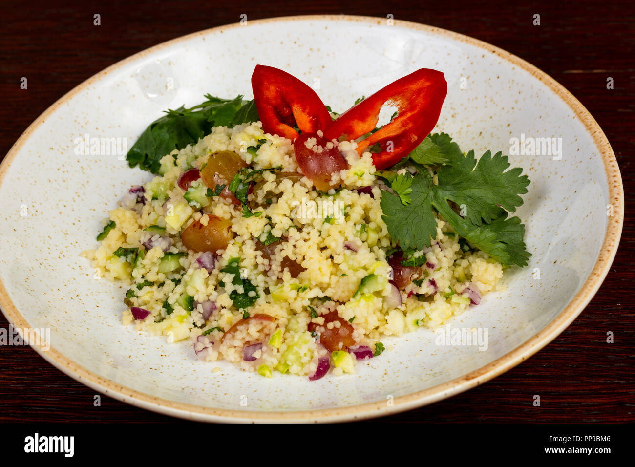 Tabule with herbs and onion Stock Photo - Alamy