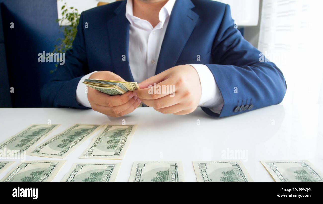 Man at desk lots of paperwork hi-res stock photography and images - Alamy