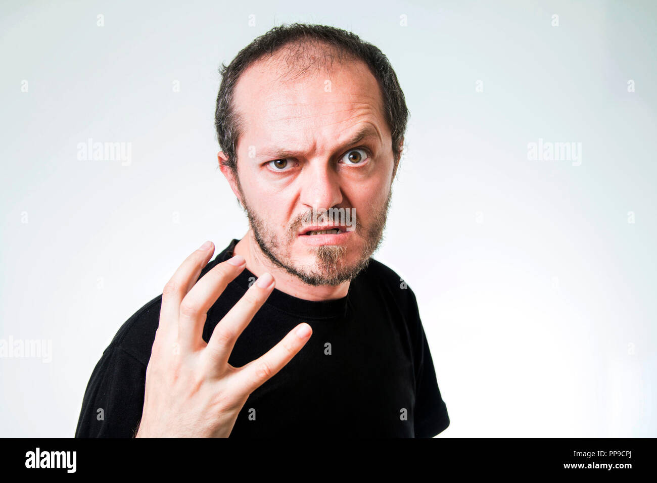 Male aggressive expression hi-res stock photography and images - Alamy