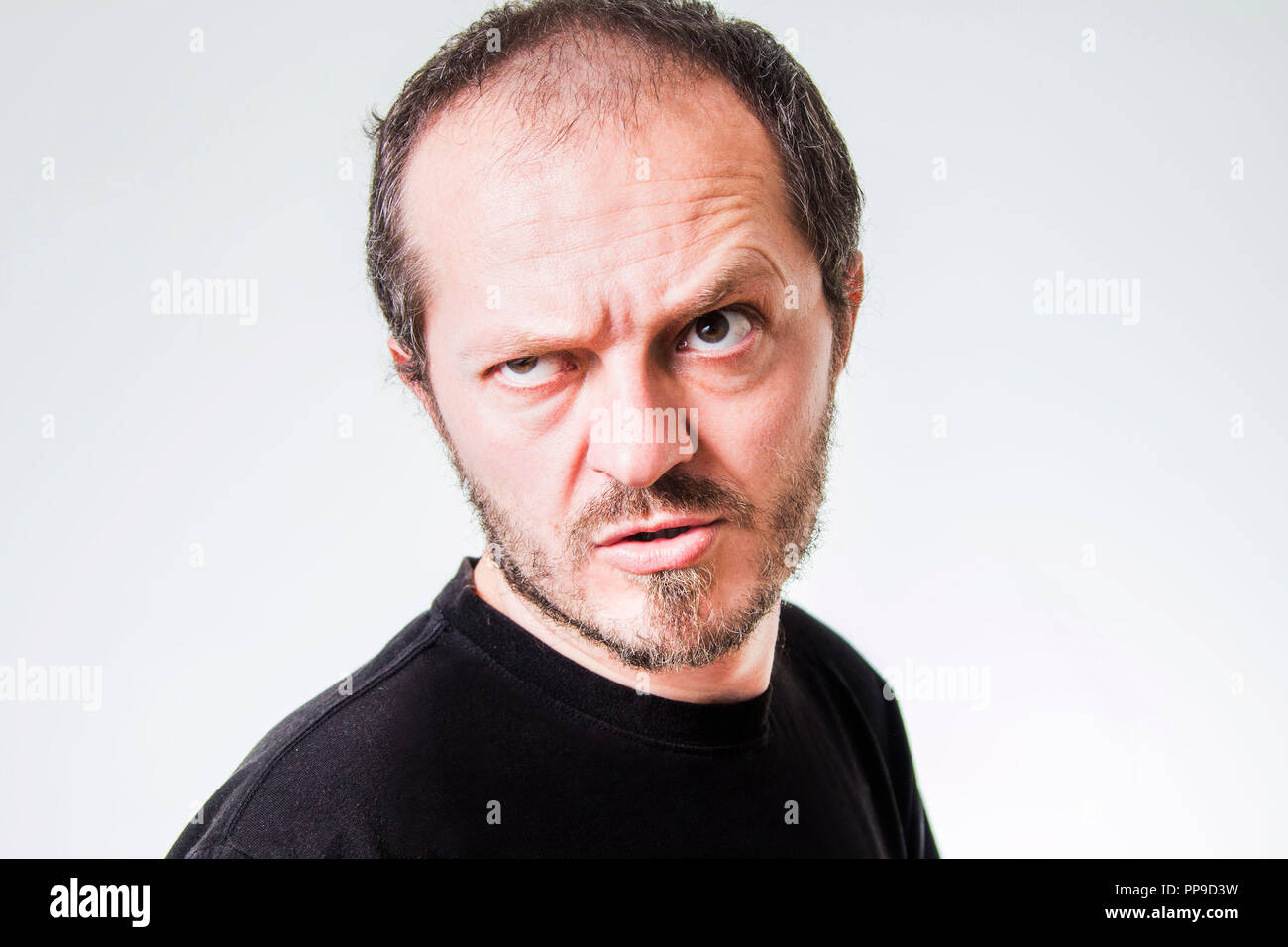 Male aggressive expression hi-res stock photography and images - Alamy