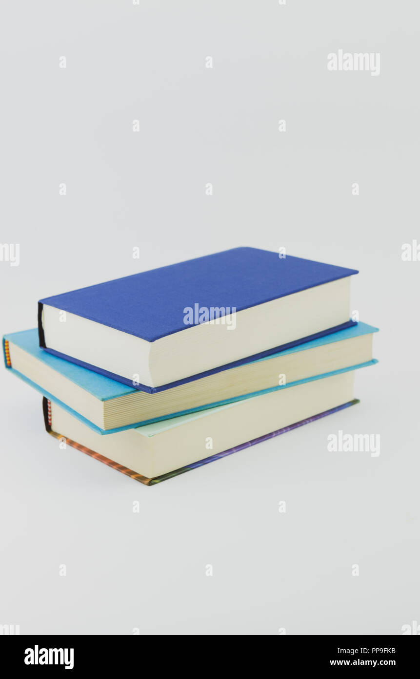 books on a white surface - education and culture concept Stock Photo ...