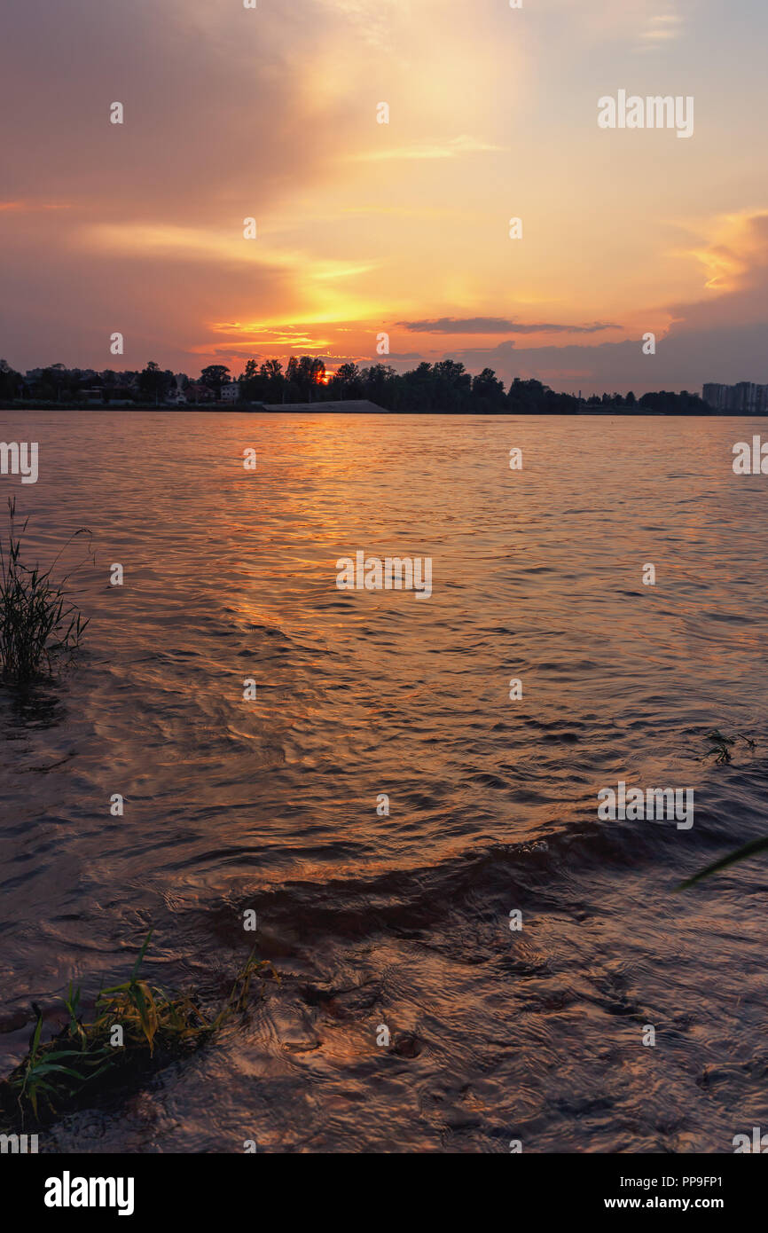 colorful sunset on the Neva river as a natural background Stock Photo ...