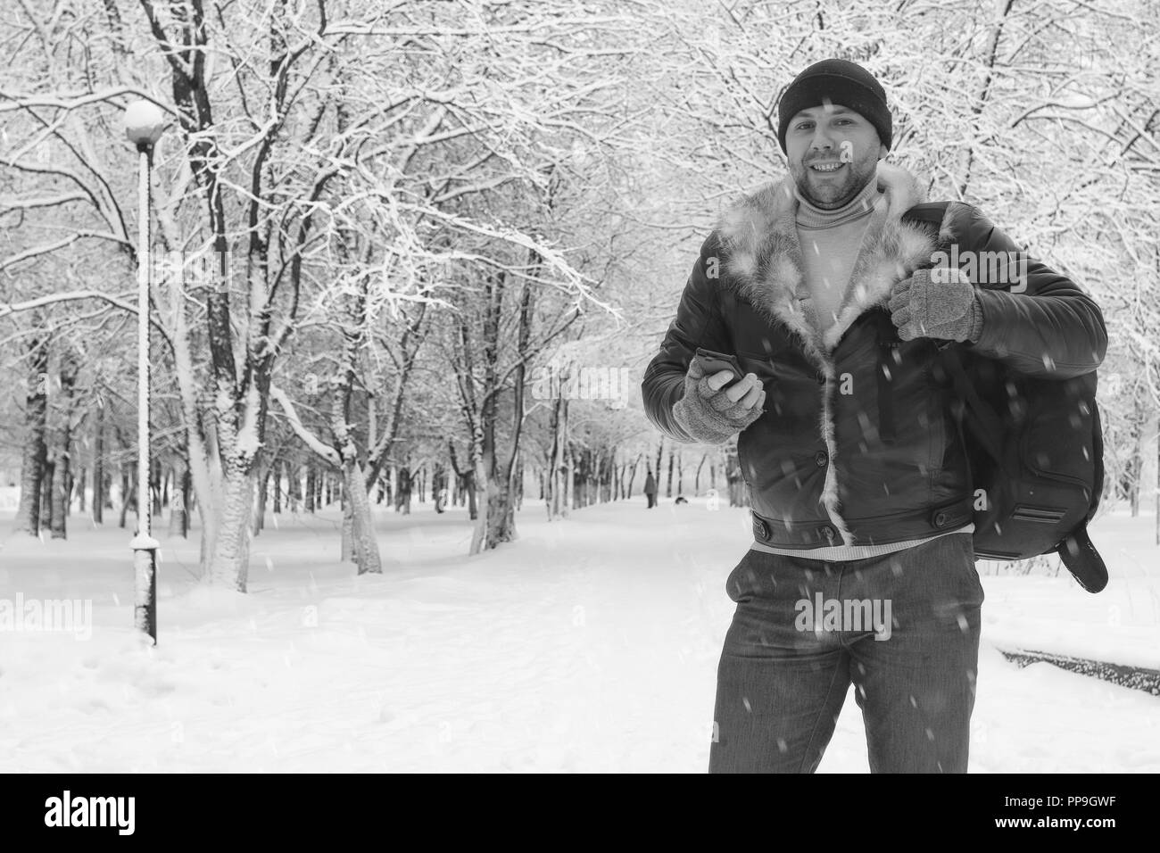 Stylish man wearing winter Black and White Stock Photos & Images - Alamy