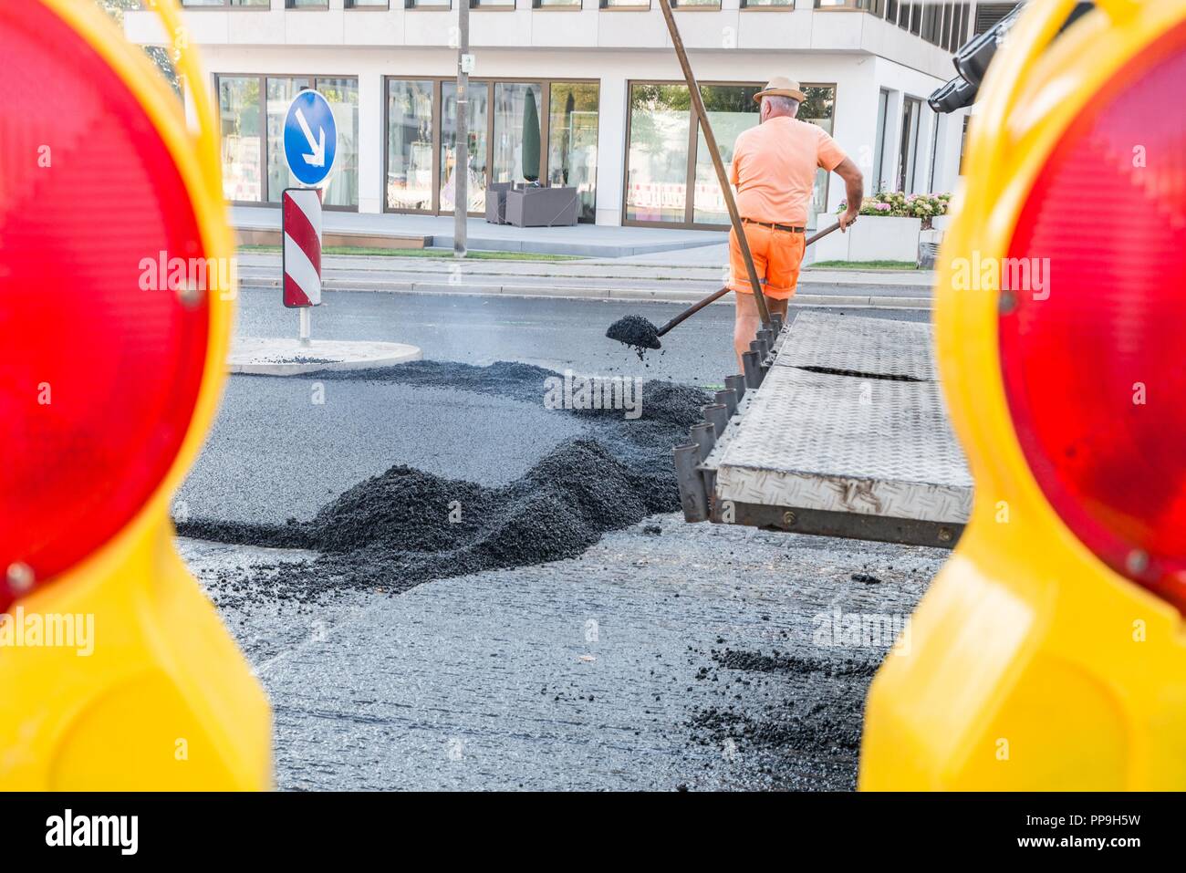 Red hot bitumen road hi-res stock photography and images - Alamy