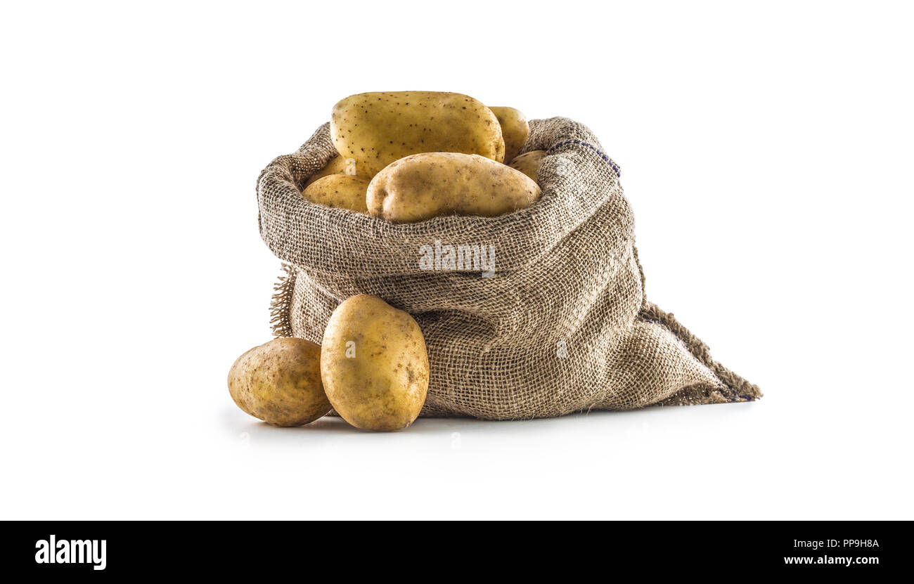 New potatoes in burlap sack isolated on white background Stock Photo ...