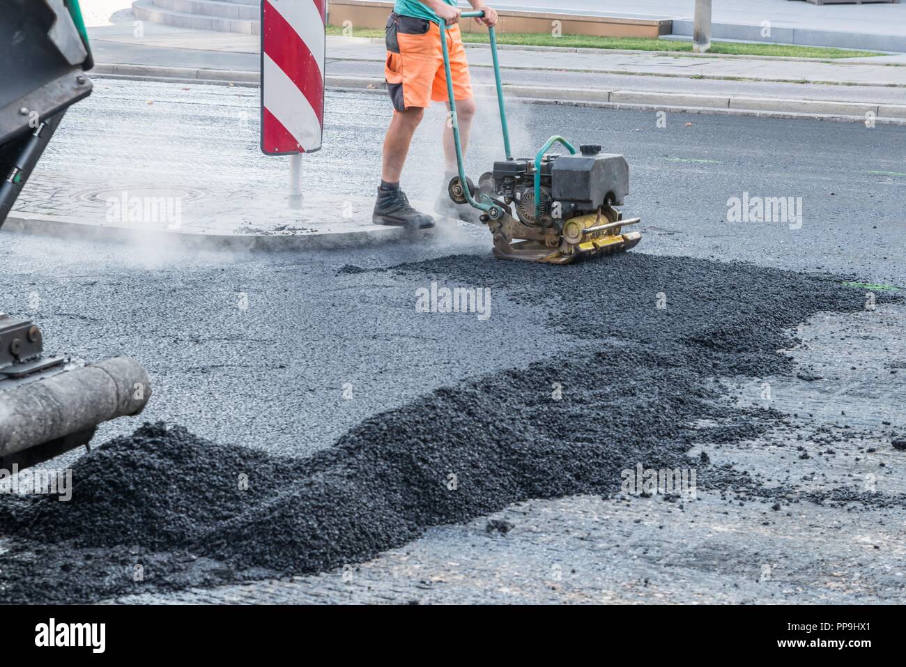 Asphalt tamper hi-res stock photography and images - Alamy