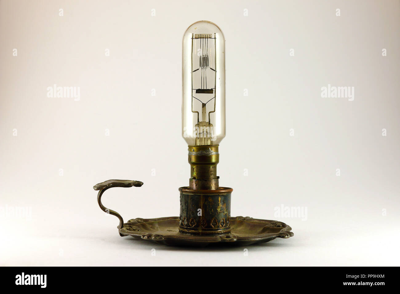Large old radio valve on white background Stock Photo - Alamy