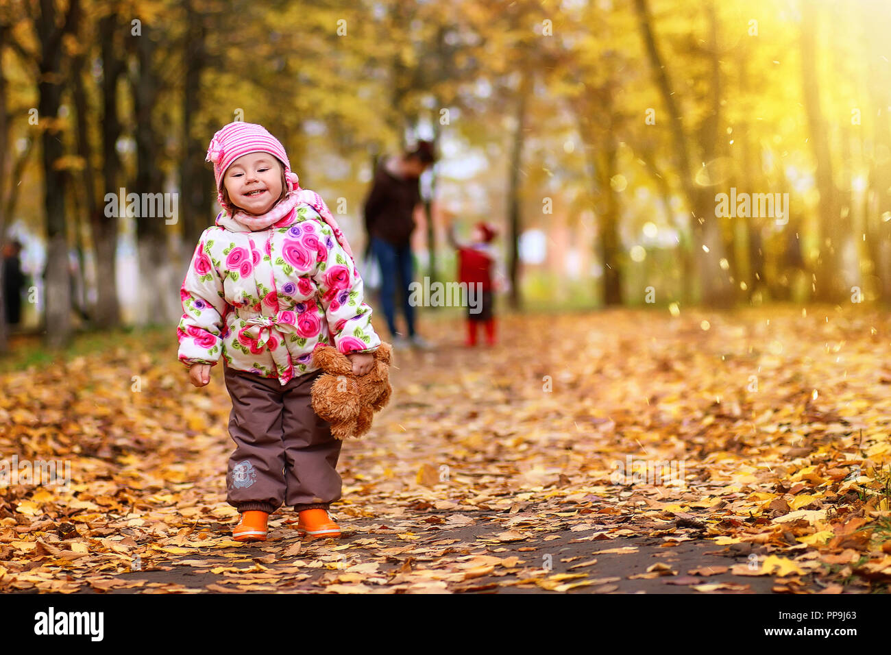 children having fun on a walk Stock Photo - Alamy