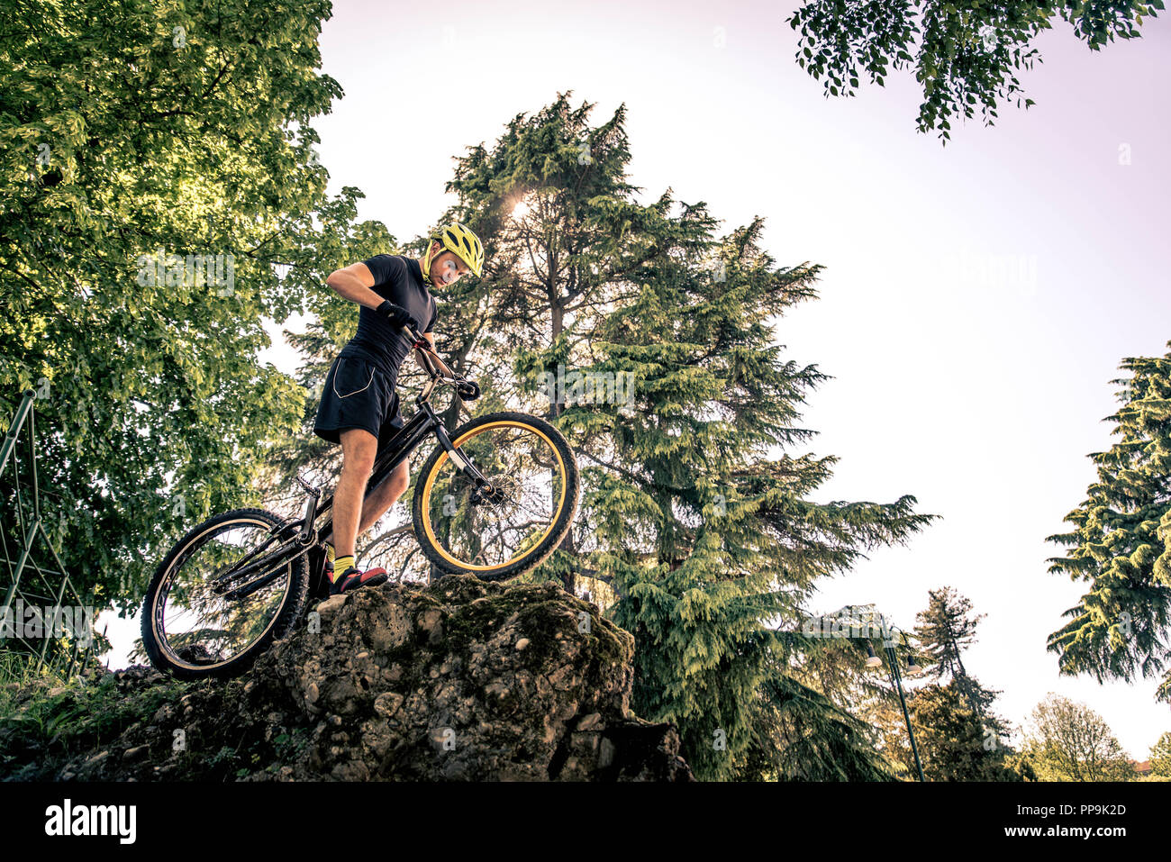 Man doing tricks with his acrobatic bike Stock Photo - Alamy