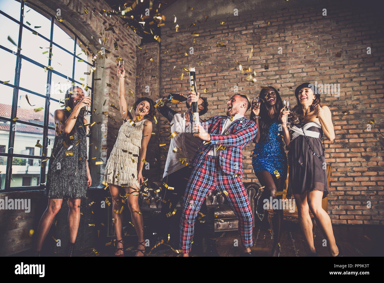 Multicultural group of friends having party - Happy people having fun ...