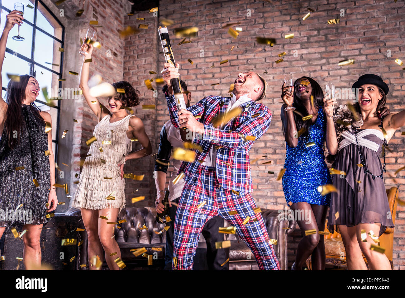 Multicultural group of friends having party - Happy people having fun ...