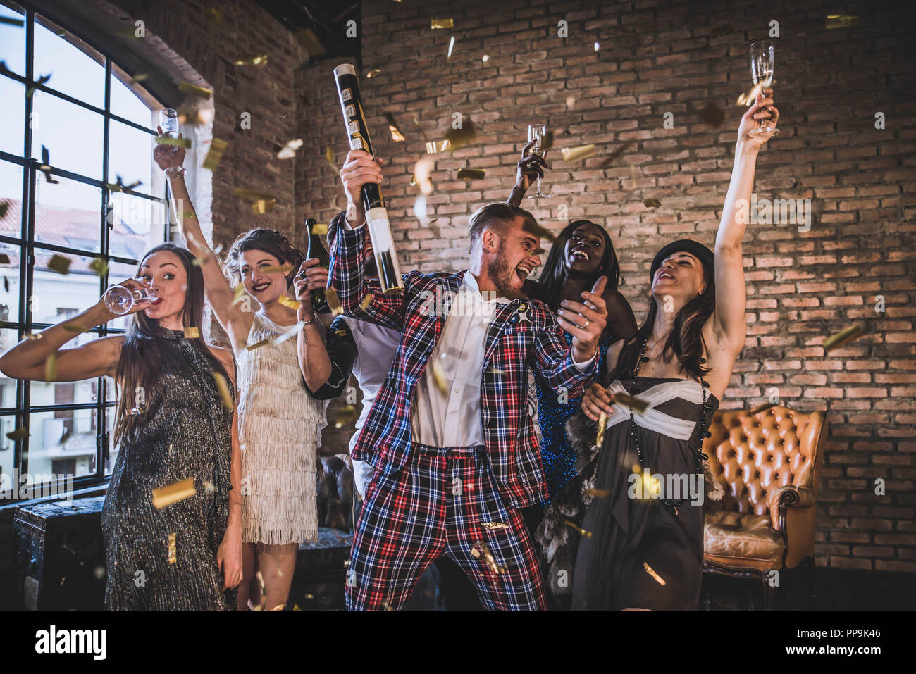 Multicultural group of friends having party - Happy people having fun ...