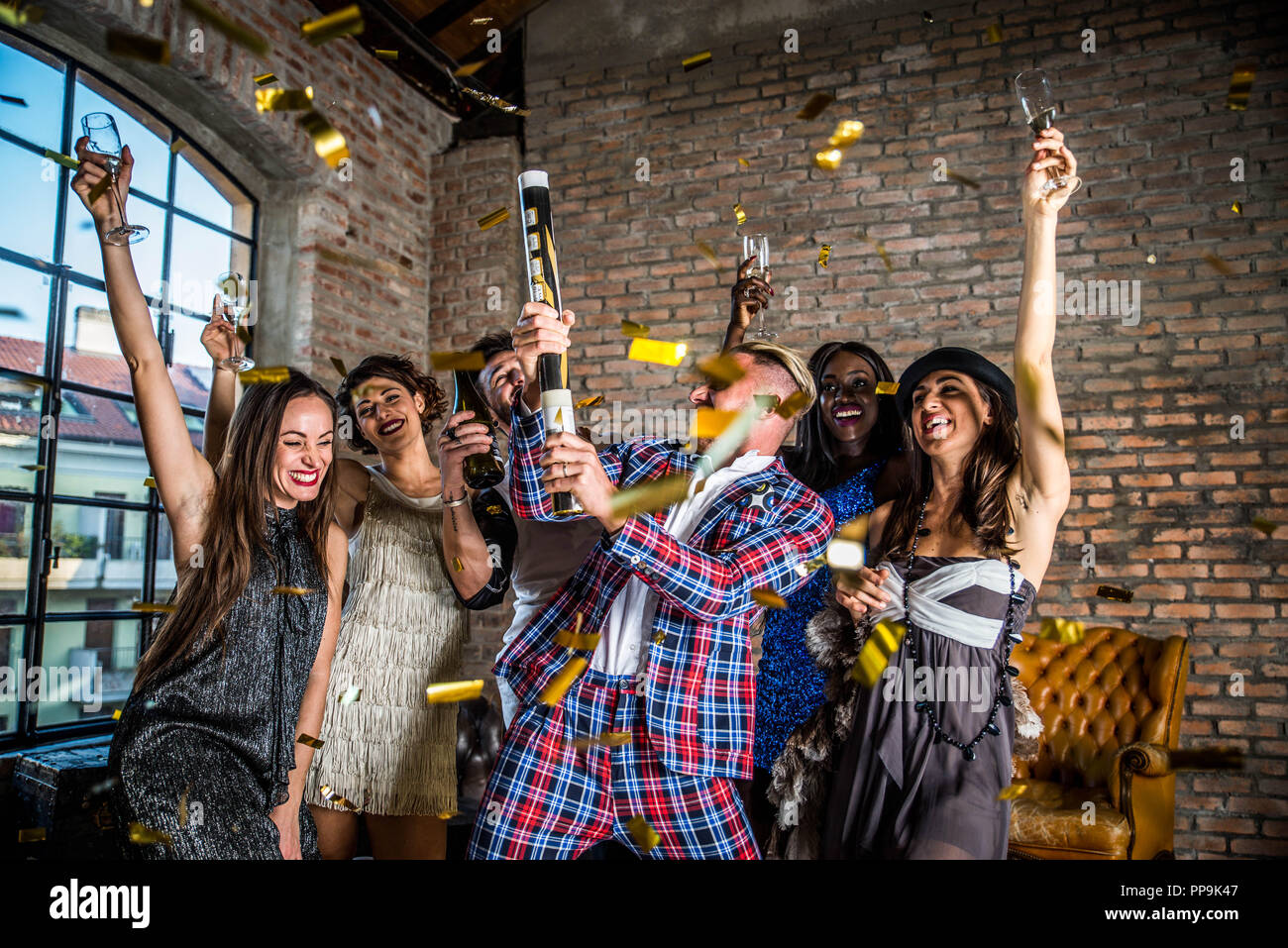 Multicultural group of friends having party - Happy people having fun ...