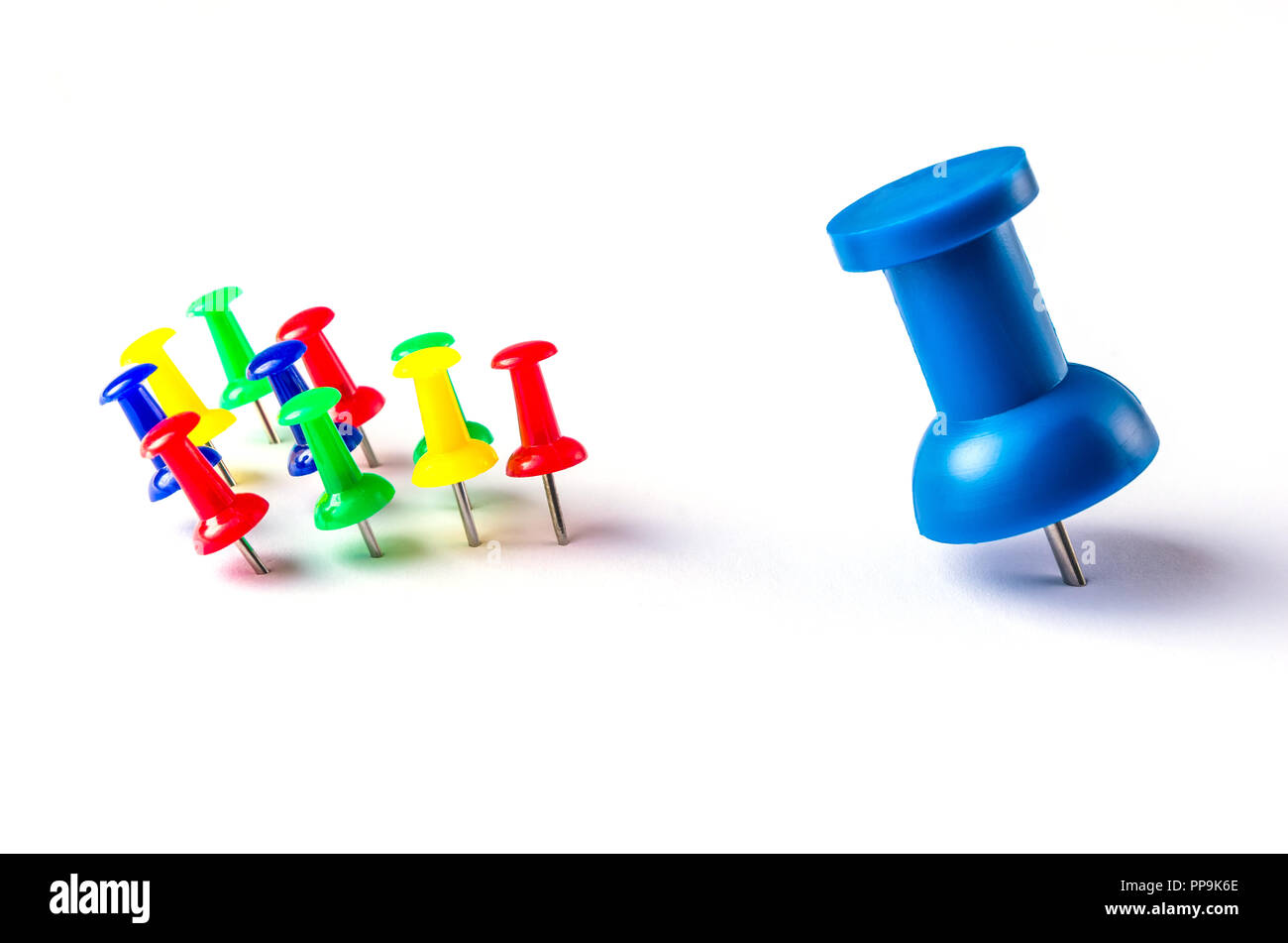 detail the different colored pins on a white background Stock Photo - Alamy