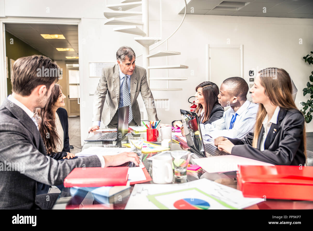 Group of businesspeople listening their boss speech - Senior manager ...