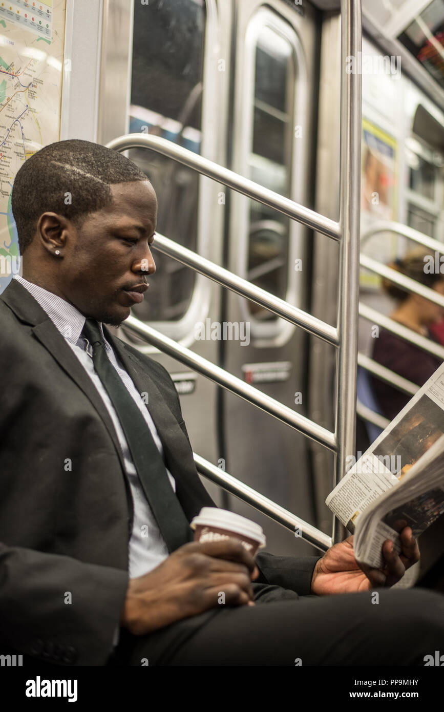 Businessman in full suit in New York subway metro Stock Photo - Alamy