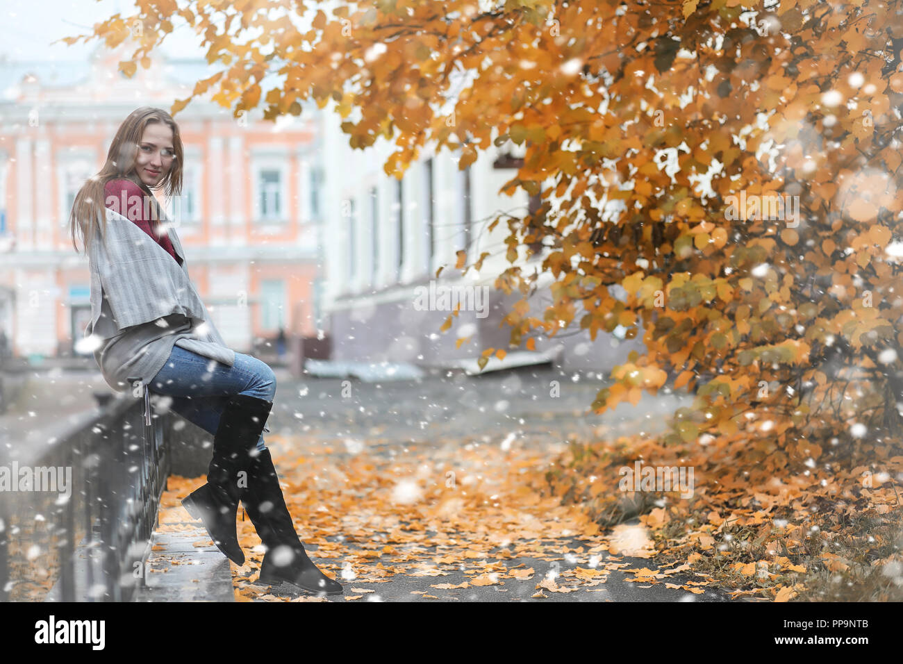 A girl in the park in the first snowfall Stock Photo - Alamy