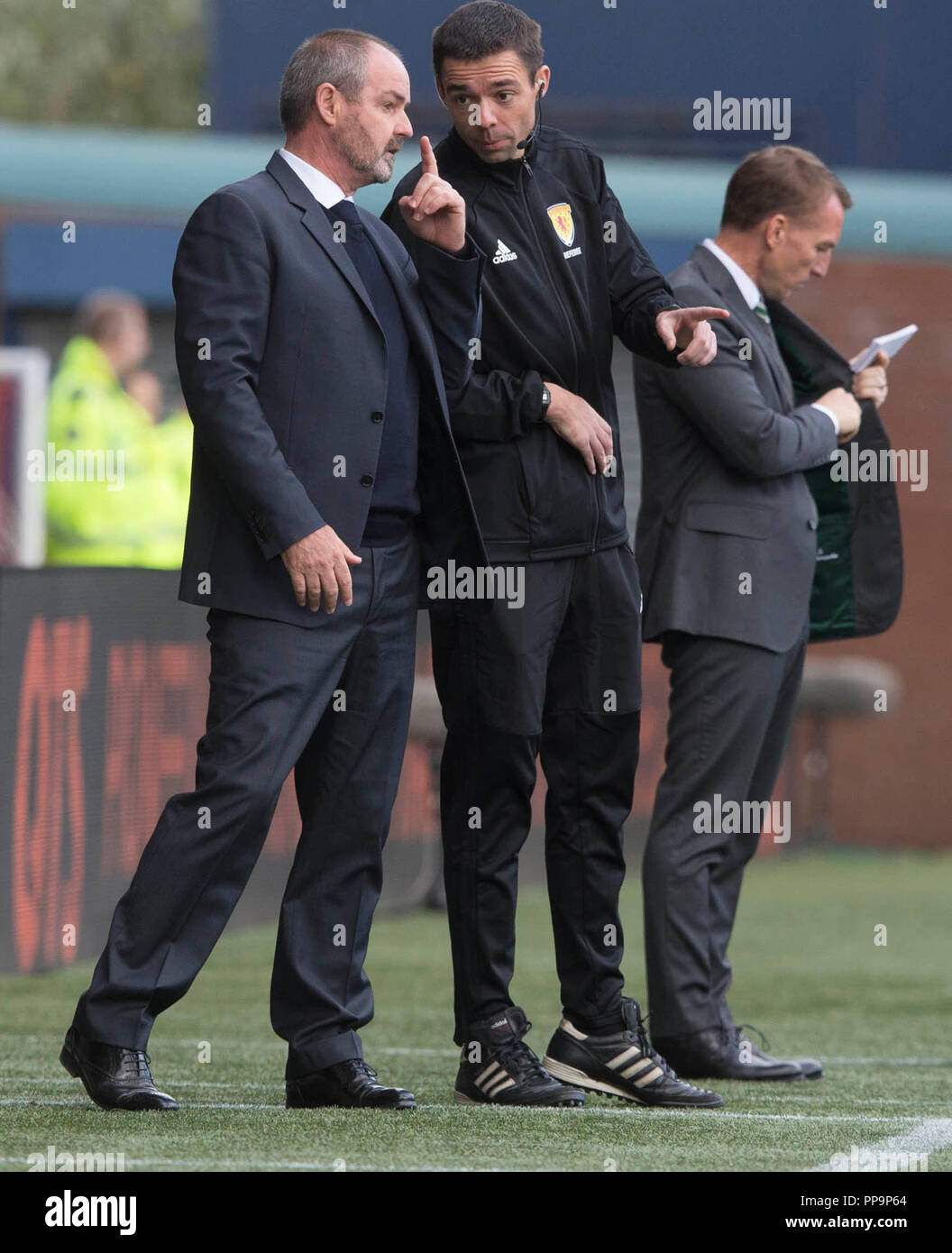 Kilmarnock's manager Steve Clarke chats to assistant referee Kevin ...
