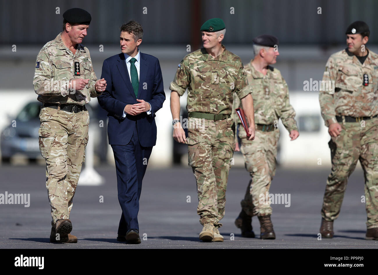 Defence Secretary Gavin Williamson (2nd left) chats with Colonel Jason ...