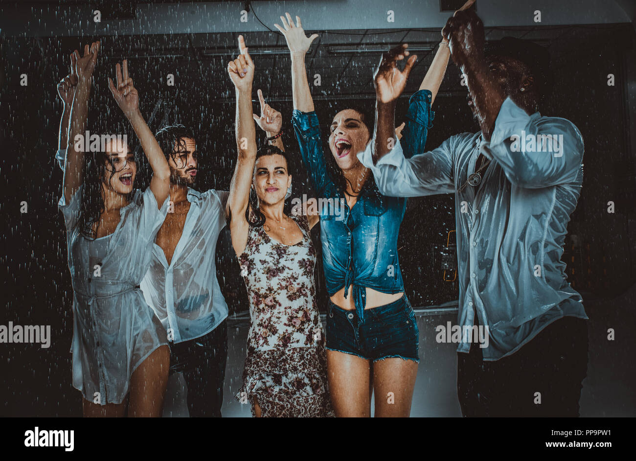 People having fun in the rain hi-res stock photography and images - Alamy