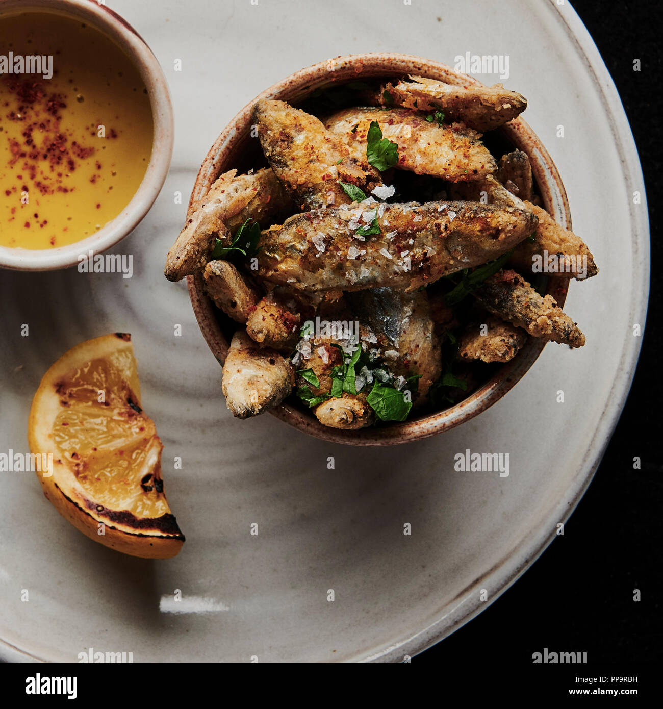 Charred fish hi-res stock photography and images - Alamy