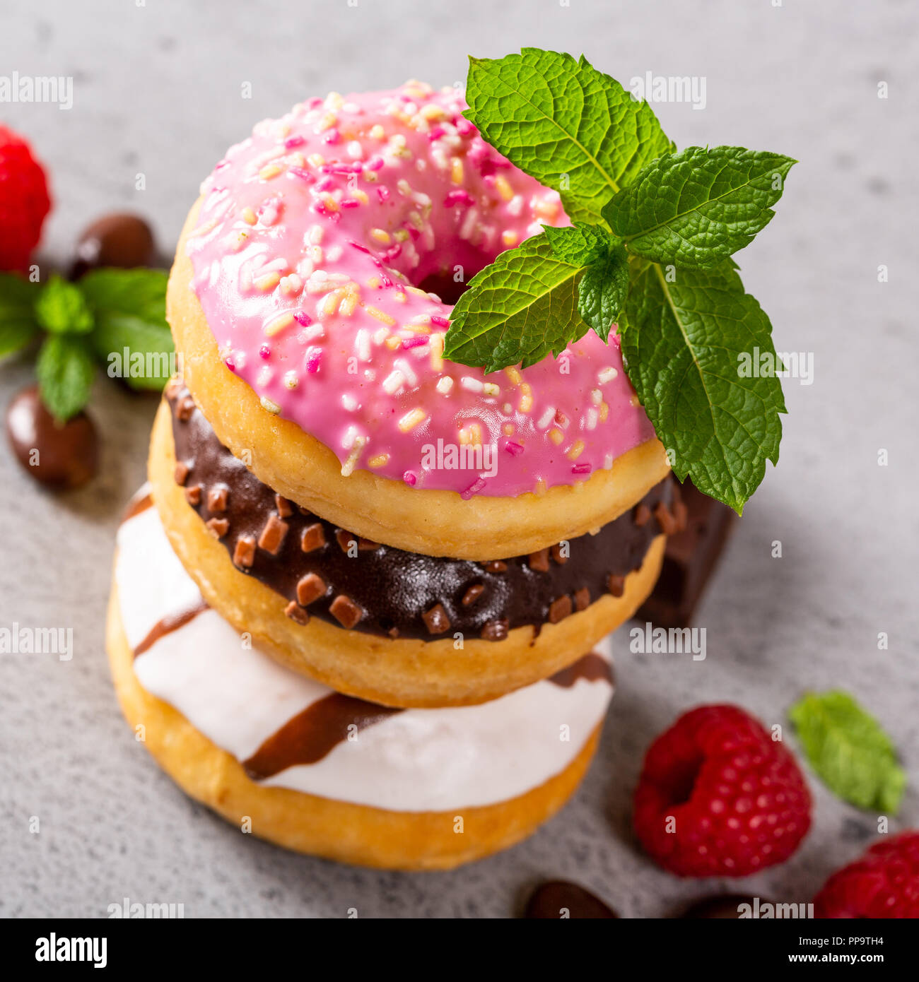 Stack of colorful donuts Stock Photo - Alamy
