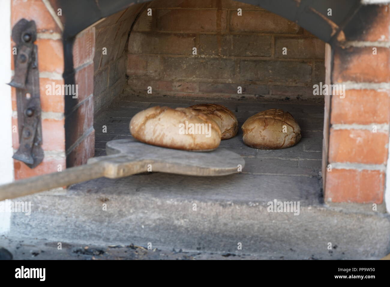 Freshly baked bread baked in a wood oven according to an old recipe ...