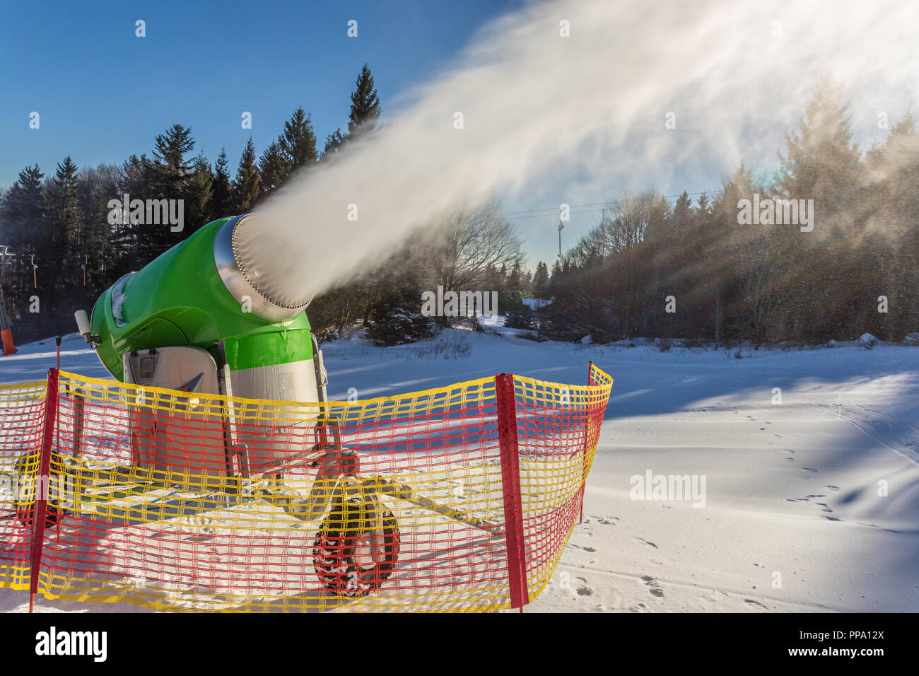 working snow gun on a hillside in the resort Stock Photo - Alamy