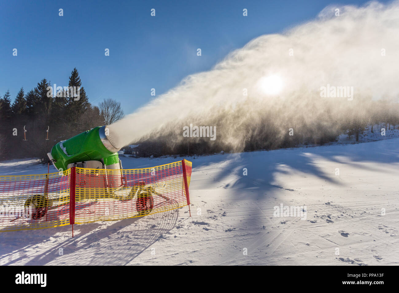 working snow gun on a hillside in the resort Stock Photo - Alamy