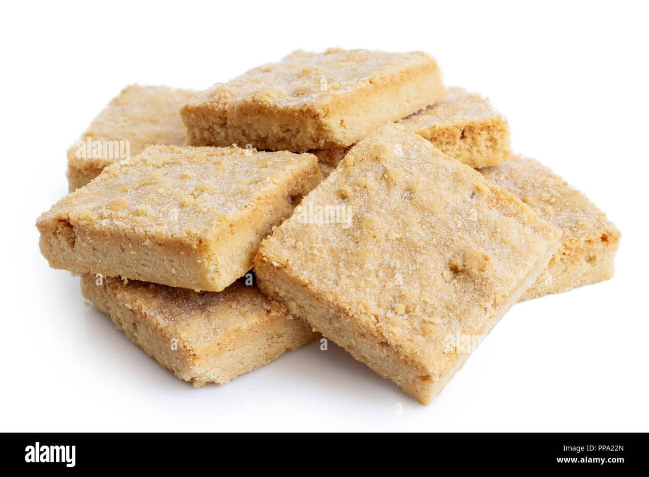 Pile of classic homemade square shortbread biscuits isolated on white ...