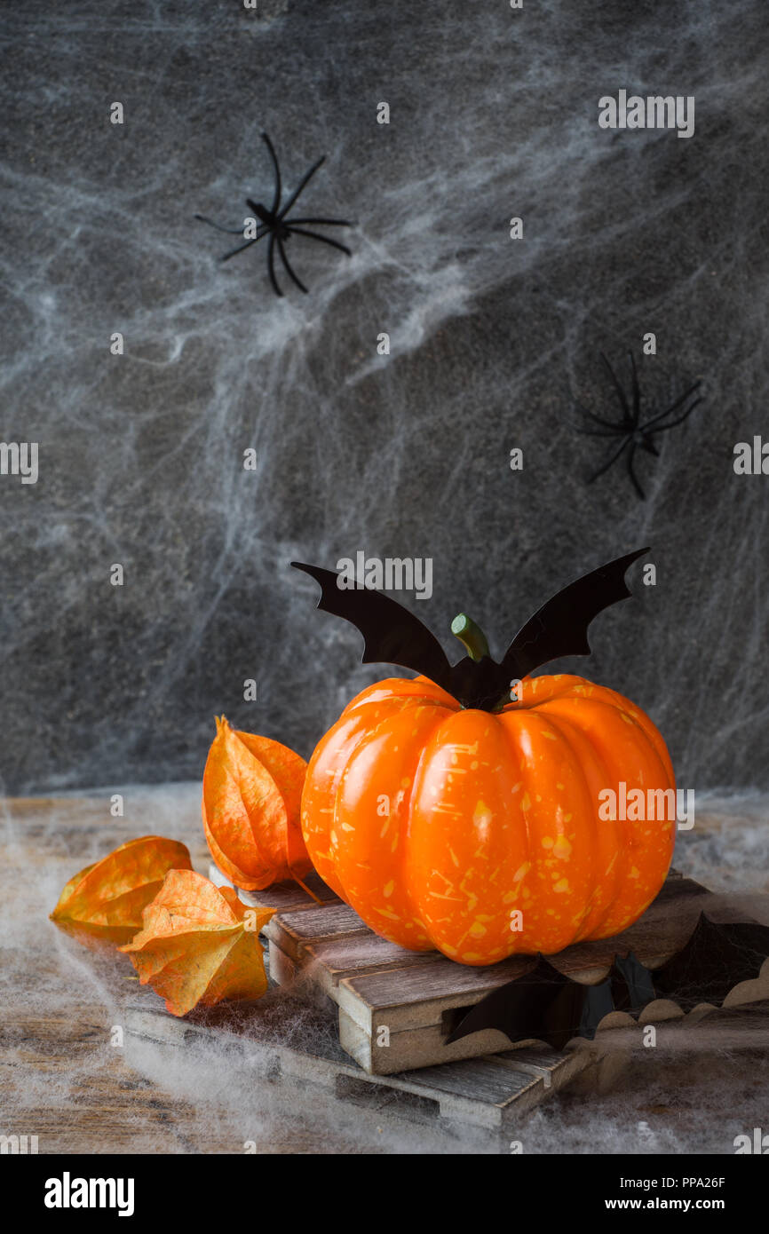 Pumpkin with bats and spiders for Halloween, selective focus. Copy ...