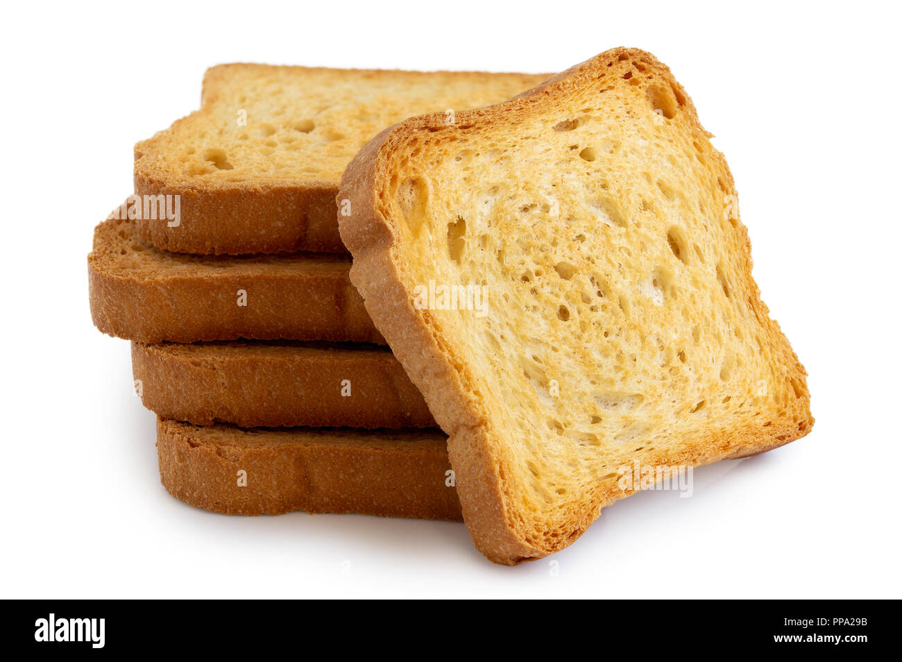 A stack of plain melba toasts isolated on white Stock Photo - Alamy