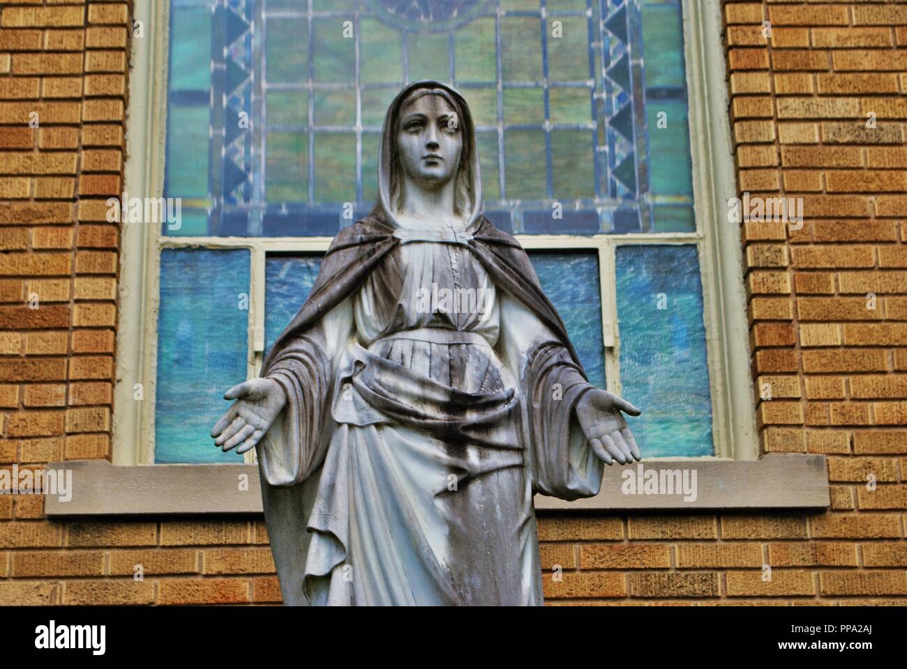 very old statue / headstone in a cemetery Stock Photo - Alamy