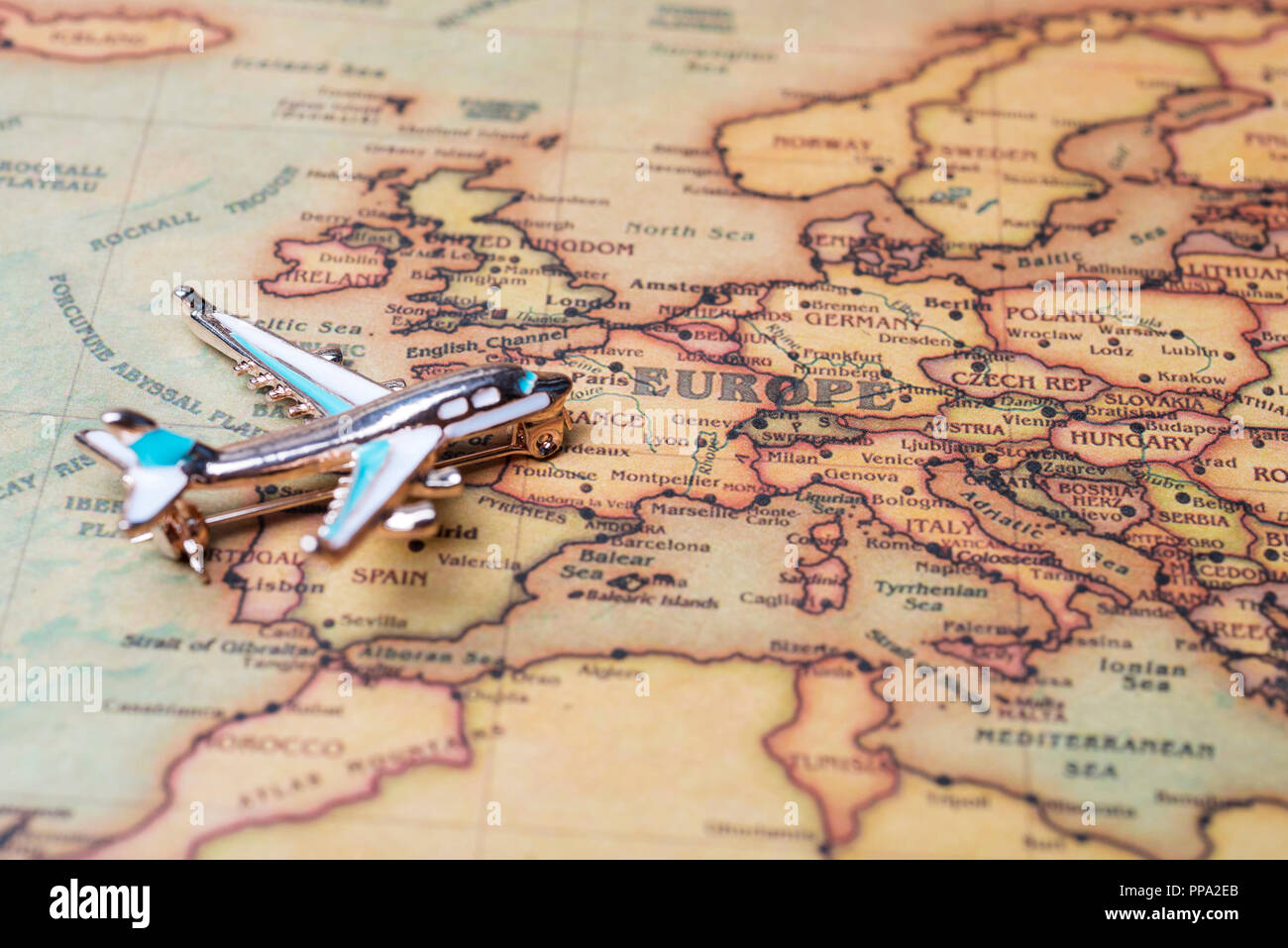 Airplane over the map of Europe. Toy airplane on the map background ...