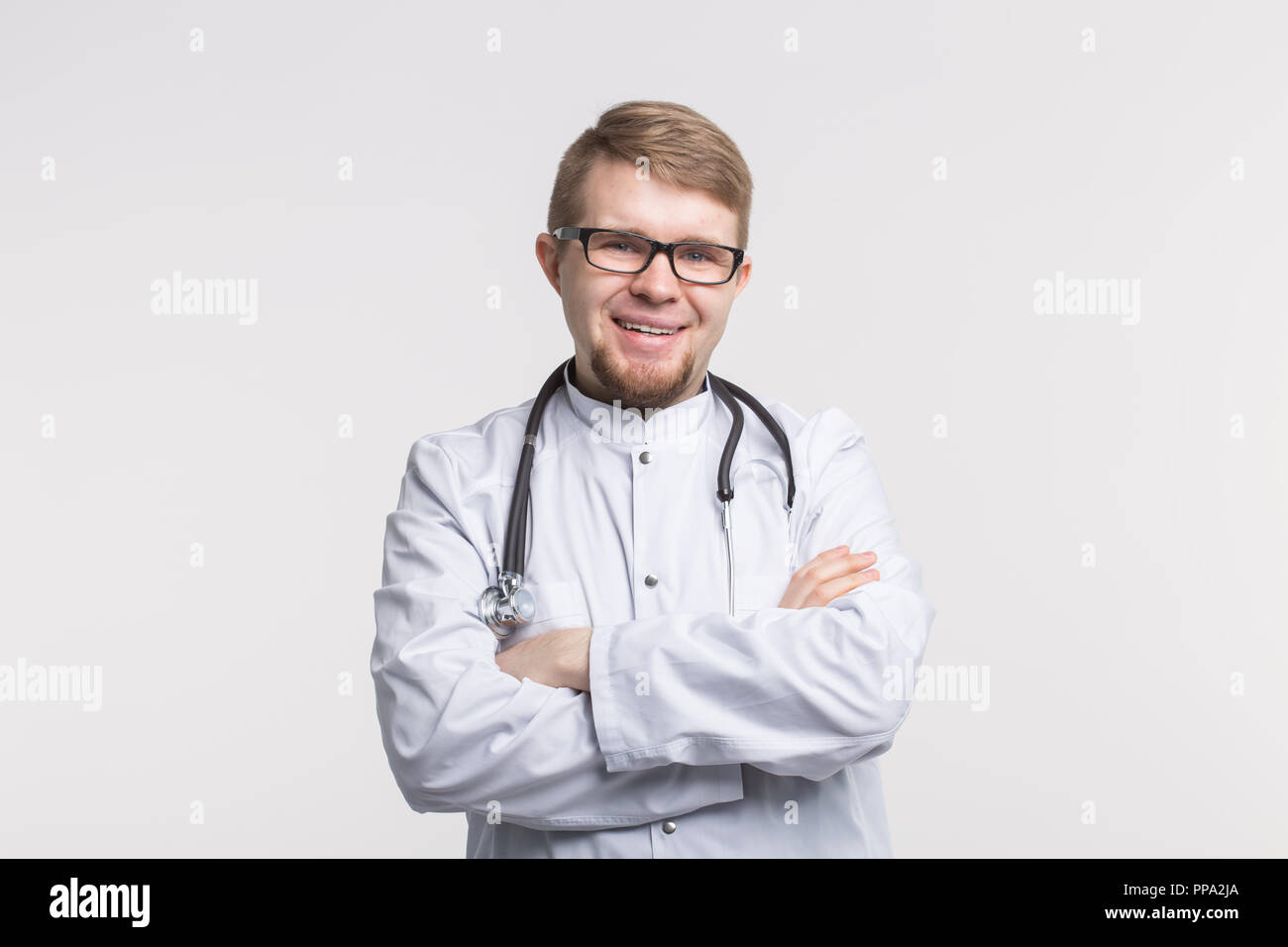 Handsome white doctor men in glasses and white medical gown Stock Photo ...