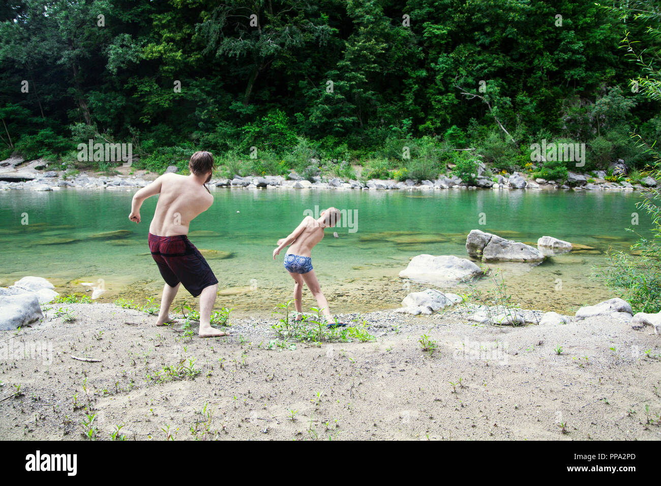 Boy throwing a stone hi-res stock photography and images - Alamy